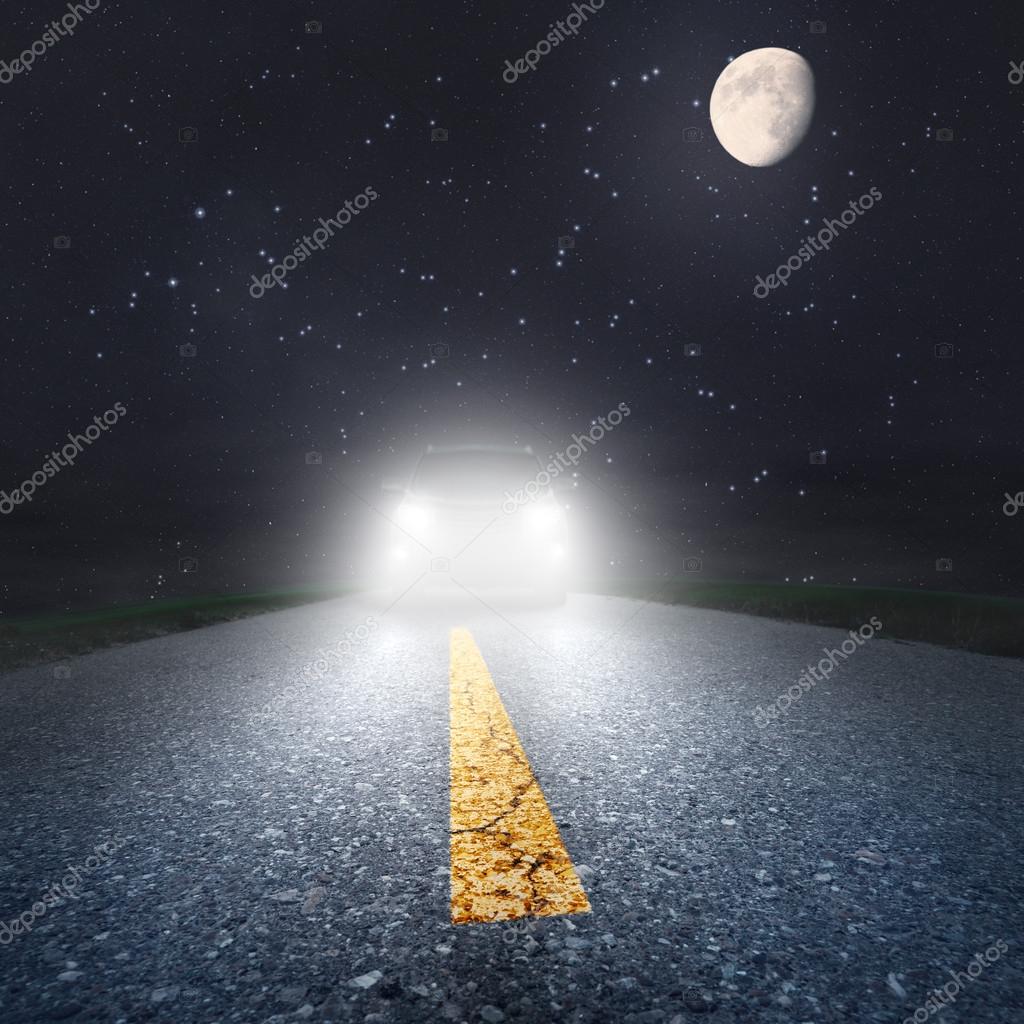 Night driving on an asphalt road towards the headlights — Stock Photo ...