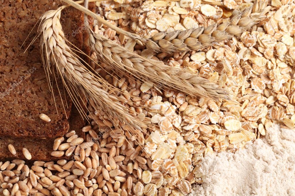 Rye bread, wheat, cereal flakes and wholegrain flour — Stock Photo ...