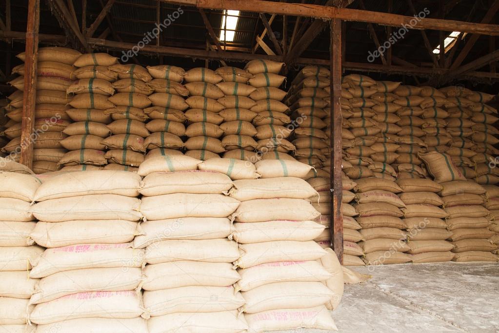 Stack hemp sacks of rice Stock Photo by ©Naypong 33518371