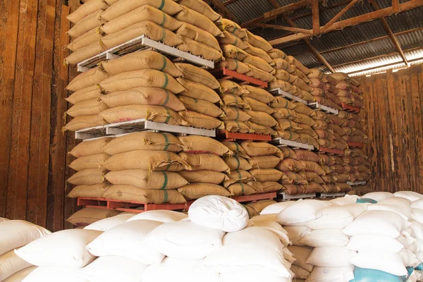 Stack hemp sacks of rice Stock Photo by ©Naypong 33518371