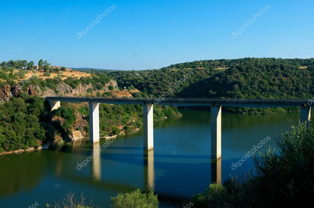 High bridge in mountains across Cedrino Lake in Sardinia, Italy ...