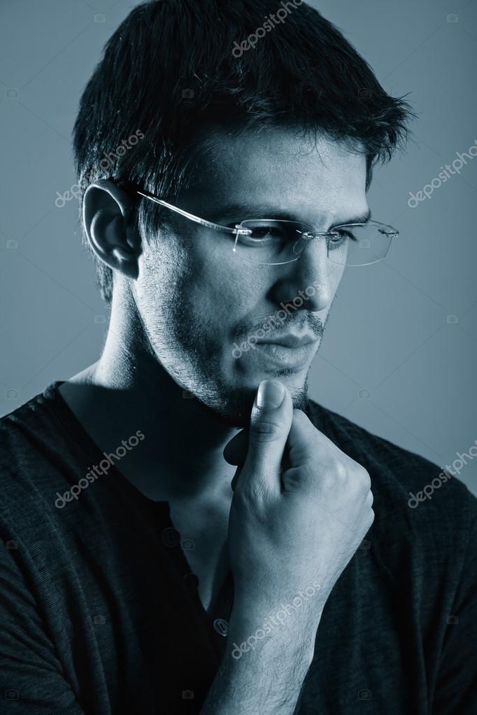Handsome male model wearing glasses — Stock Photo © Dangubic #26364199