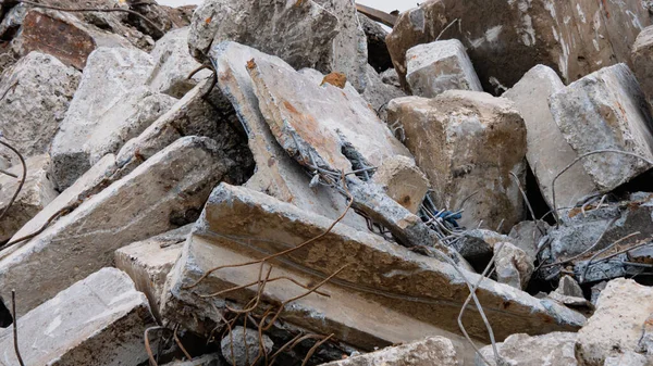 A pile of concrete debris from a building. Destroyed cement building ...