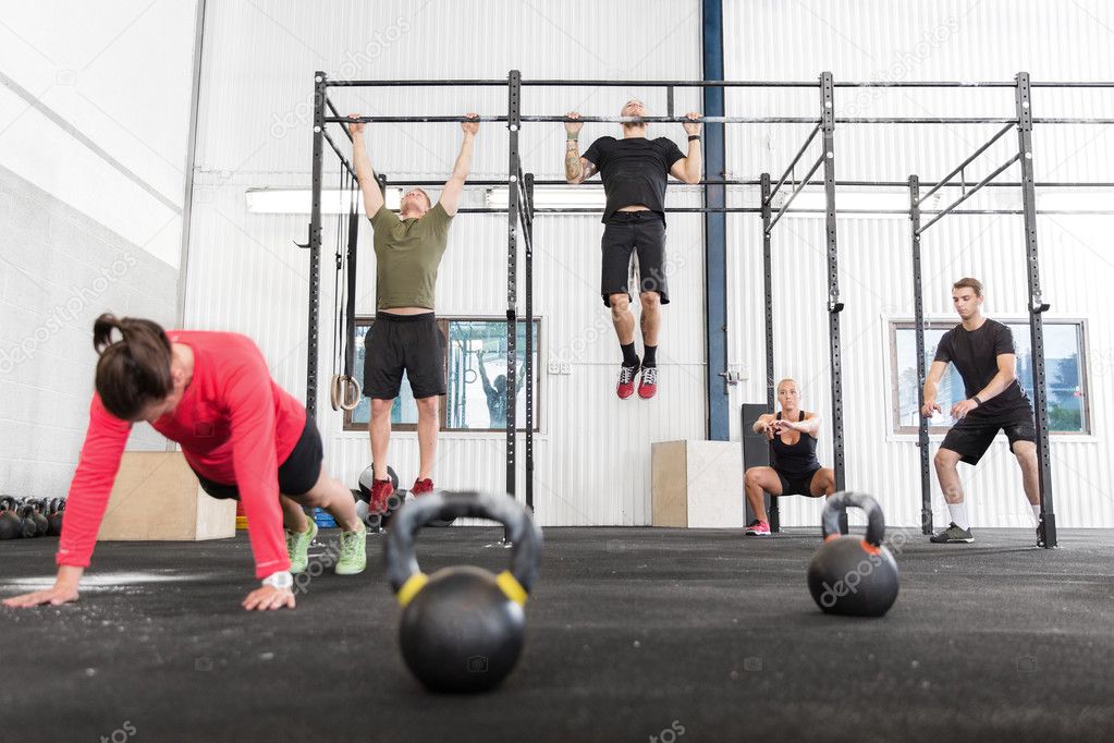 Crossfit group trains different exercises — Stock Photo © kjekol #47266093