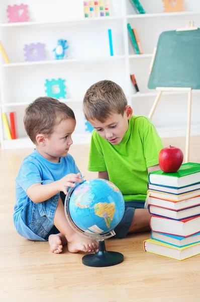 Geography Lesson with Globe - Stock Image - Everypixel