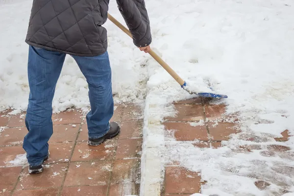 Shovel snow Stock Photos, Royalty Free Shovel snow Images | Depositphotos®