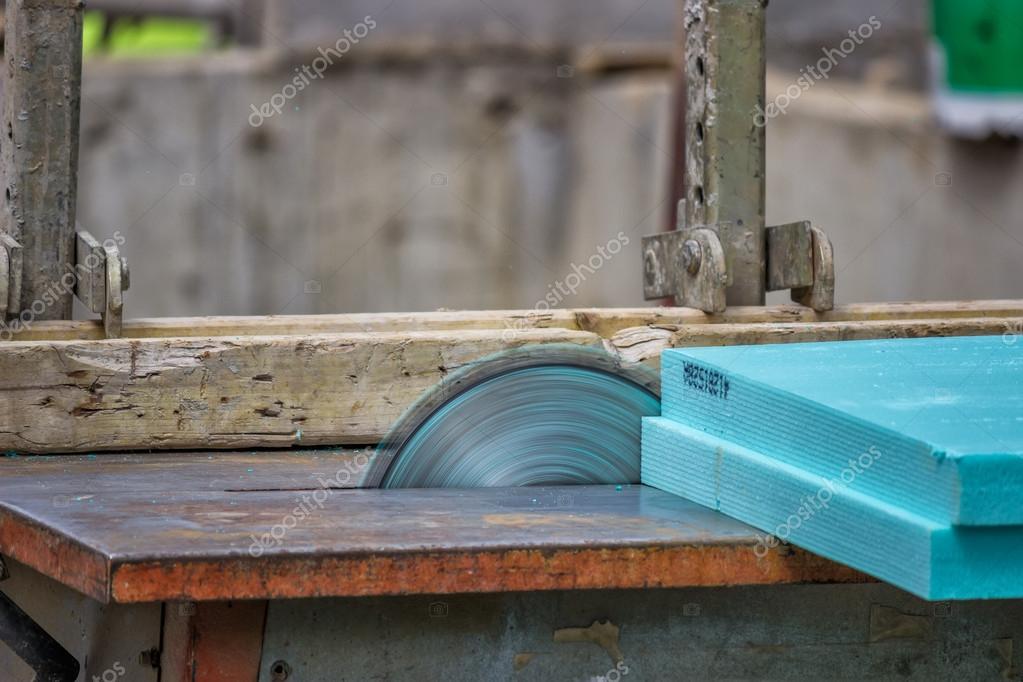 Cutting insulation foam with cutting machine — Stock Photo ...