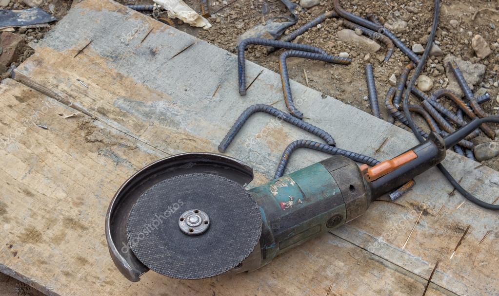 Angle grinder after cutting spacer for the rebar Stock Photo by ...