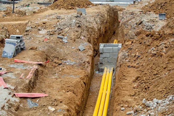 Laying underground cables Stock Photos, Royalty Free Laying underground ...