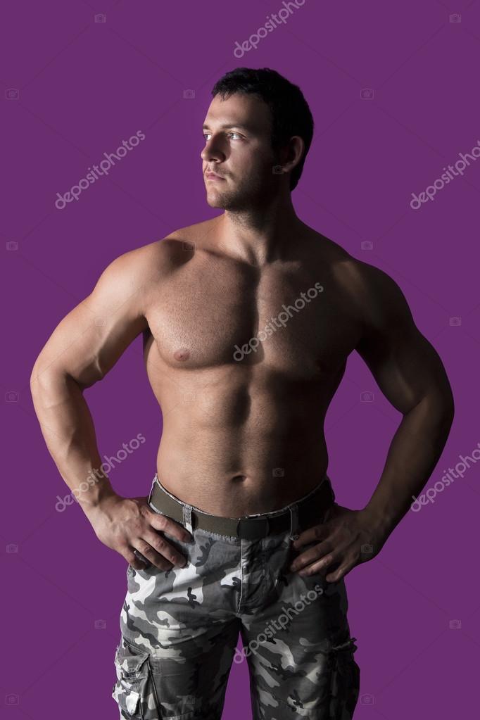 Muscular model posing. Stock Photo by ©eskymaks 27344113