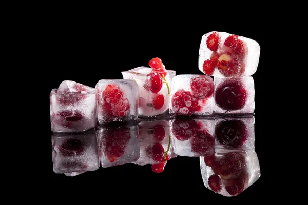 Frozen fruit in ice cubes. Stock Photo by ©eskymaks 27437451