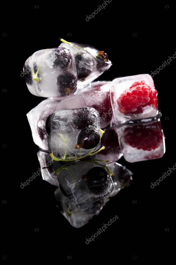 Frozen fruit in ice cubes. Stock Photo by ©eskymaks 27437451