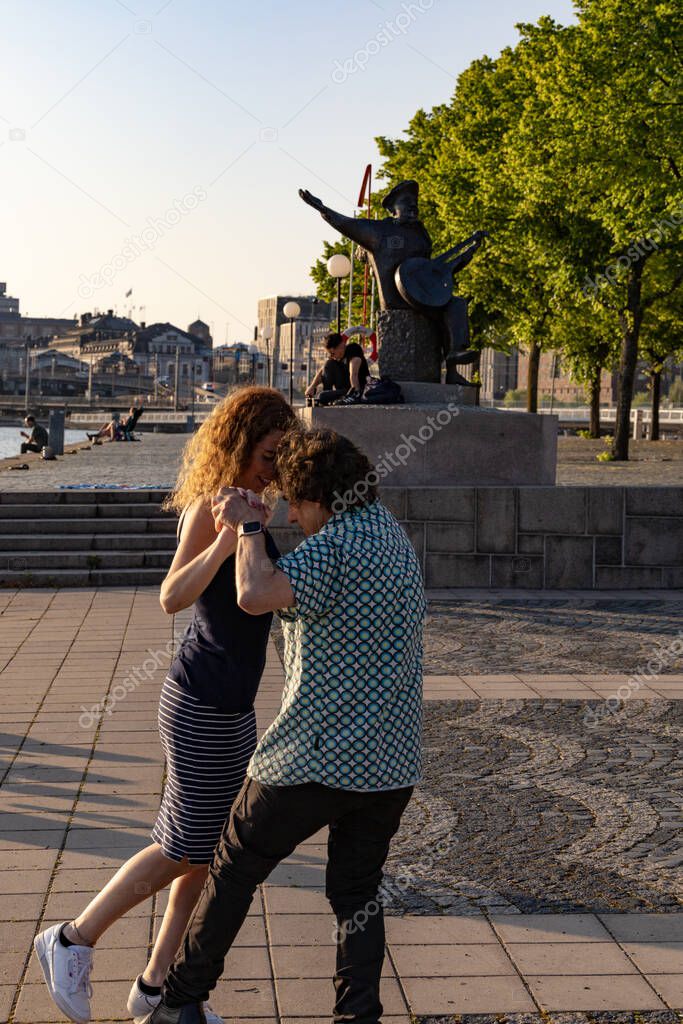 Stockholm, Sweden Dancers practive tango dancing on Riddarholmen near ...