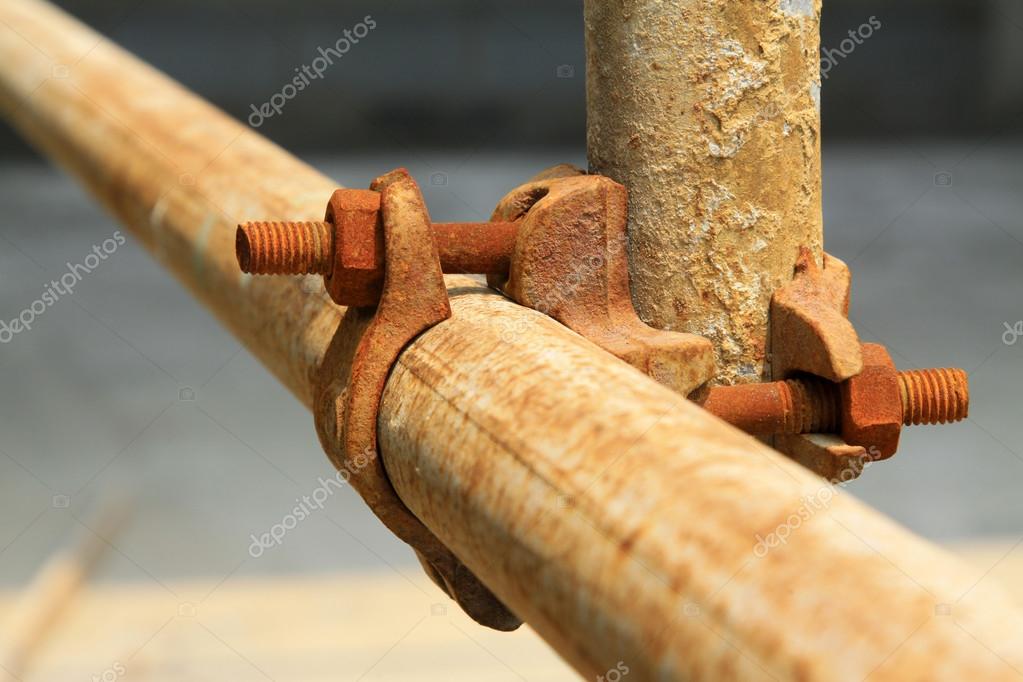 Rusty metal scaffolding elements Stock Photo by ©zhangyuangeng 43579483