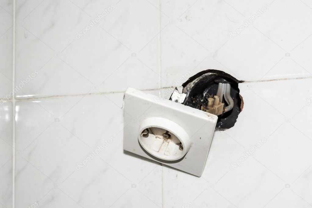 Damaged electrical socket — Stock Photo © anze.bizjan #48261885