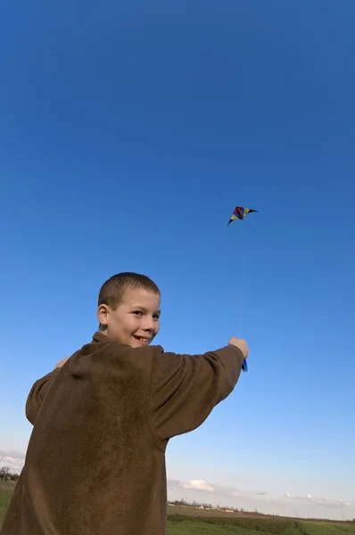 Boy flying a paper air plane Stock Photos, Royalty Free Boy flying a ...