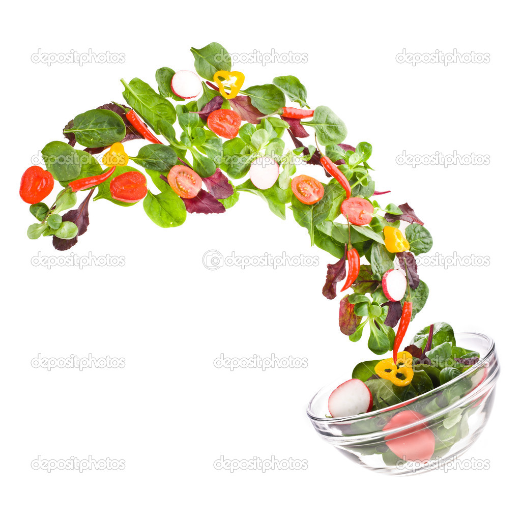 Flying fresh salad isolated over white background Stock Photo by ...