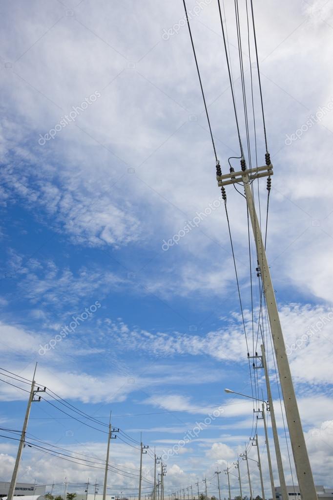 Power lines on the blue sky with cloudy background Stock Photo by ...
