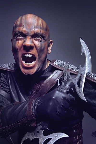 Portrait of man with double-bladed glaive Stock Photo by ©FREE0NE 40948431