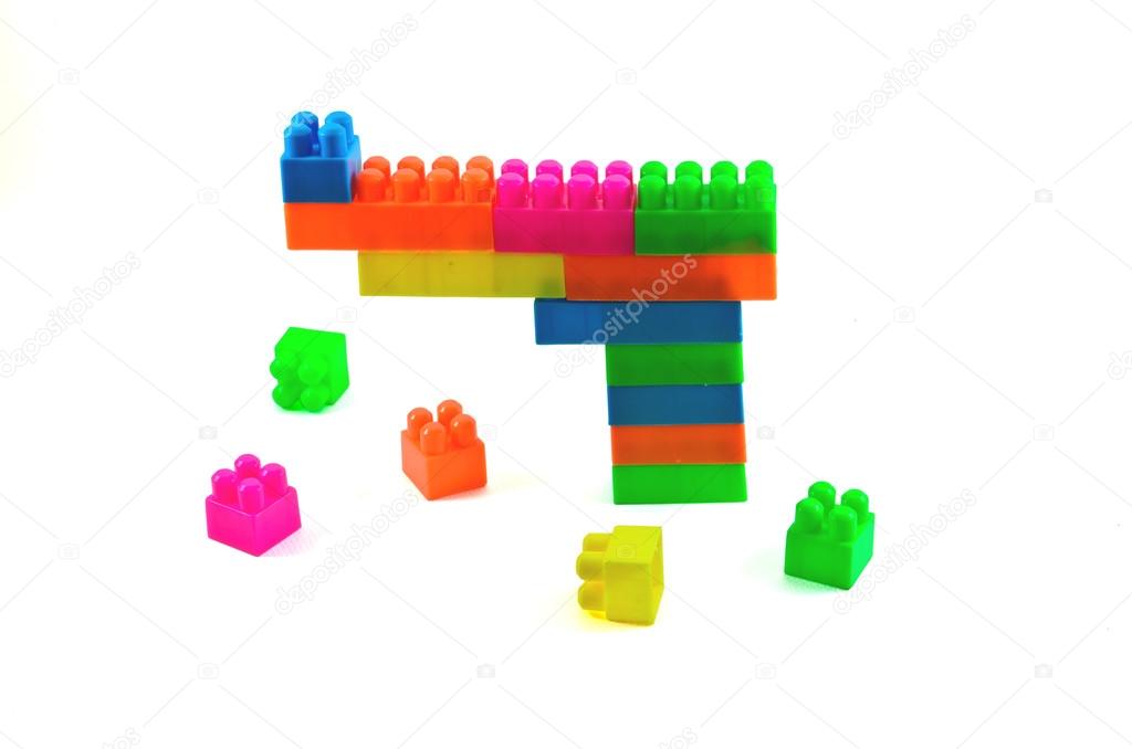 Plastic building blocks,toy gun – Stock Editorial Photo © surawutob ...
