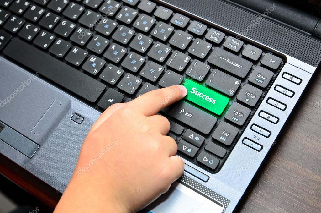 Finger of chind pushing the button of keyboard — Stock Photo ...