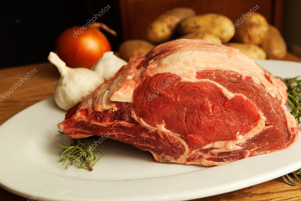 Beautifully marbled seven pound ribeye roast bone in, laying on its ...