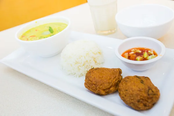 Rice and curry and SHRIMP CAKE - Stock Image - Everypixel