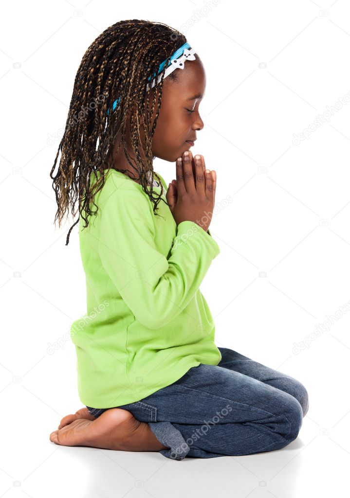 Child Kneeling In Prayer