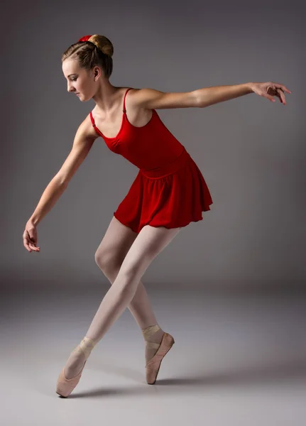 Ballet dancer wearing red dress over grey — Stock Photo © Julenochek ...