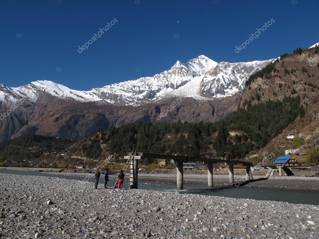 Damaged bridge over Kali Ghandaki River, Dhaulagiri Stock Photo by ...