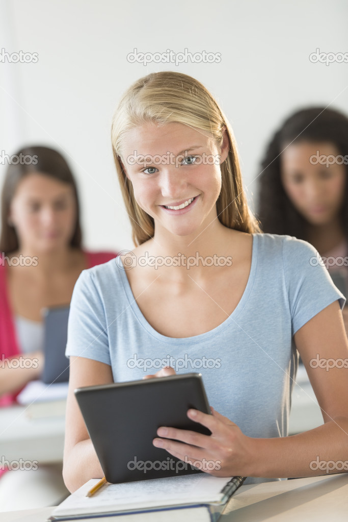 Beautiful Teenage Student Holding Digital Tablet At Desk — Stock Photo ...