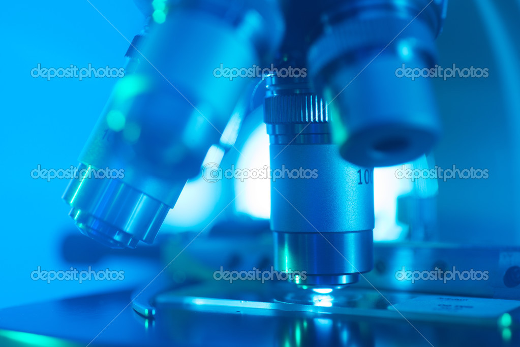 Microscope Lens On Slide Stock Photo by ©tmcphotos 32925365