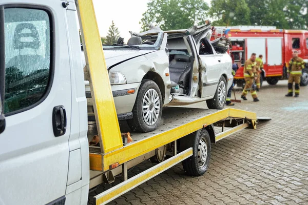 Wrecked car loading on tow truck after crash traffic accident, Concept ...