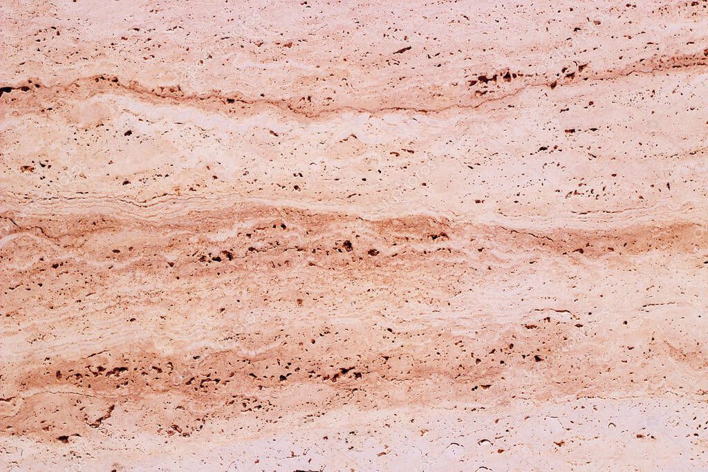 la textura de la piedra natural del matiz rosado es semejante al mármol ...