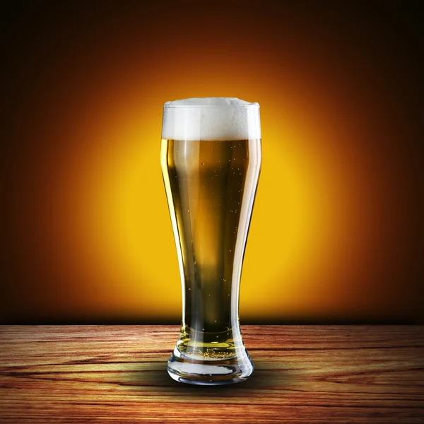 Glass of Beer on wood table - Stock Image - Everypixel