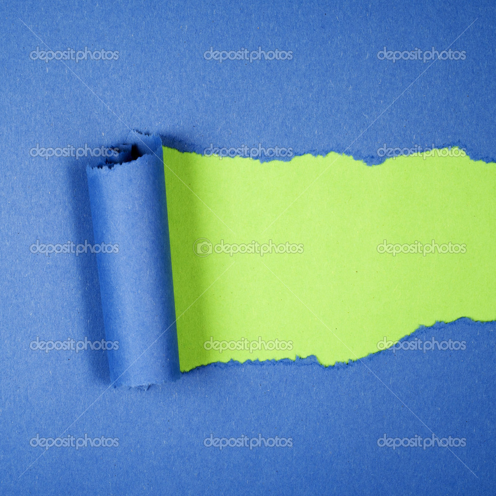Torn blue color paper on green color background Stock Photo by ...