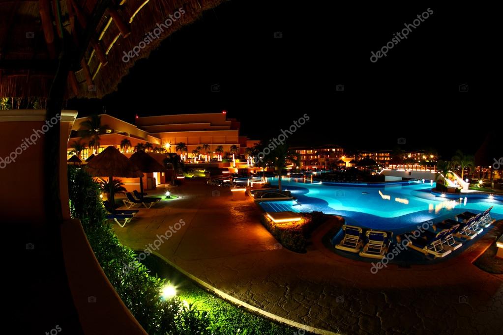 A luxury all inclusive beach resort at night — Stock Photo © gary718 ...