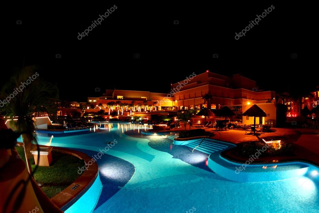 A luxury all inclusive beach resort at night — Stock Photo © gary718 ...