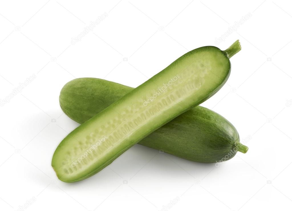 Two mini snack cucumbers one sliced in halve ⬇ Stock Photo, Image by ...
