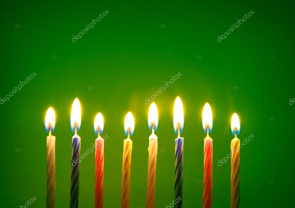 Image of eight birthday candles over green background Stock Photo by ...