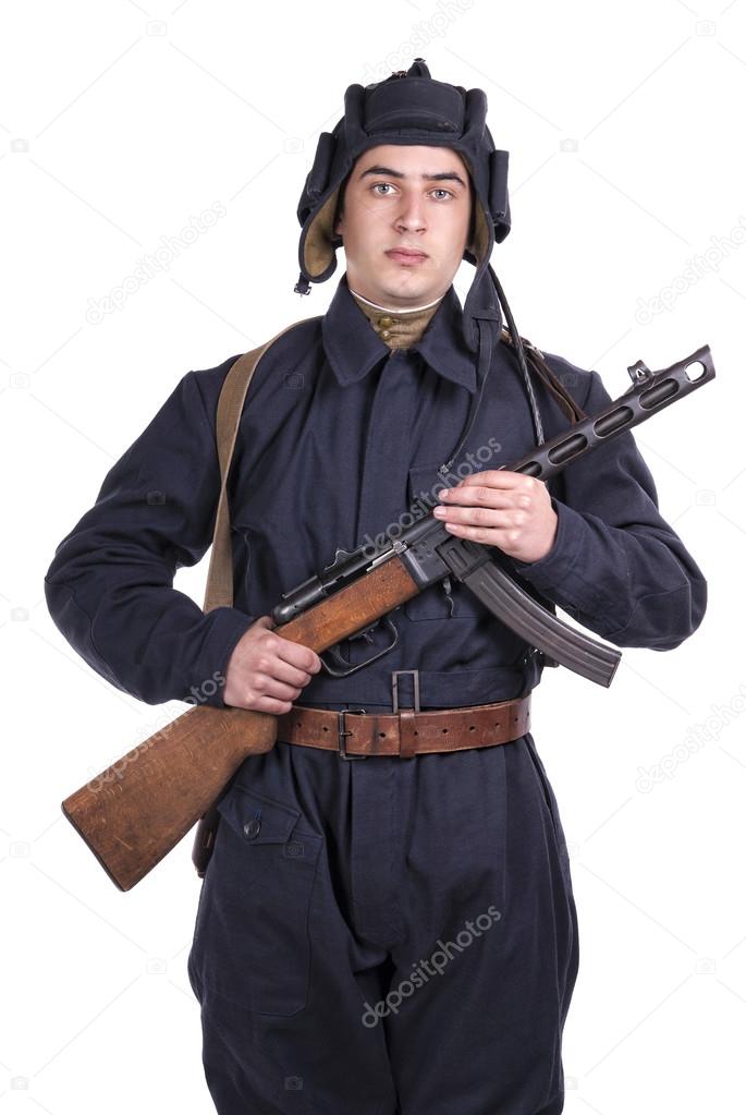 Young Soviet tank driver with his gun — Stock Photo © philipimage #45145949