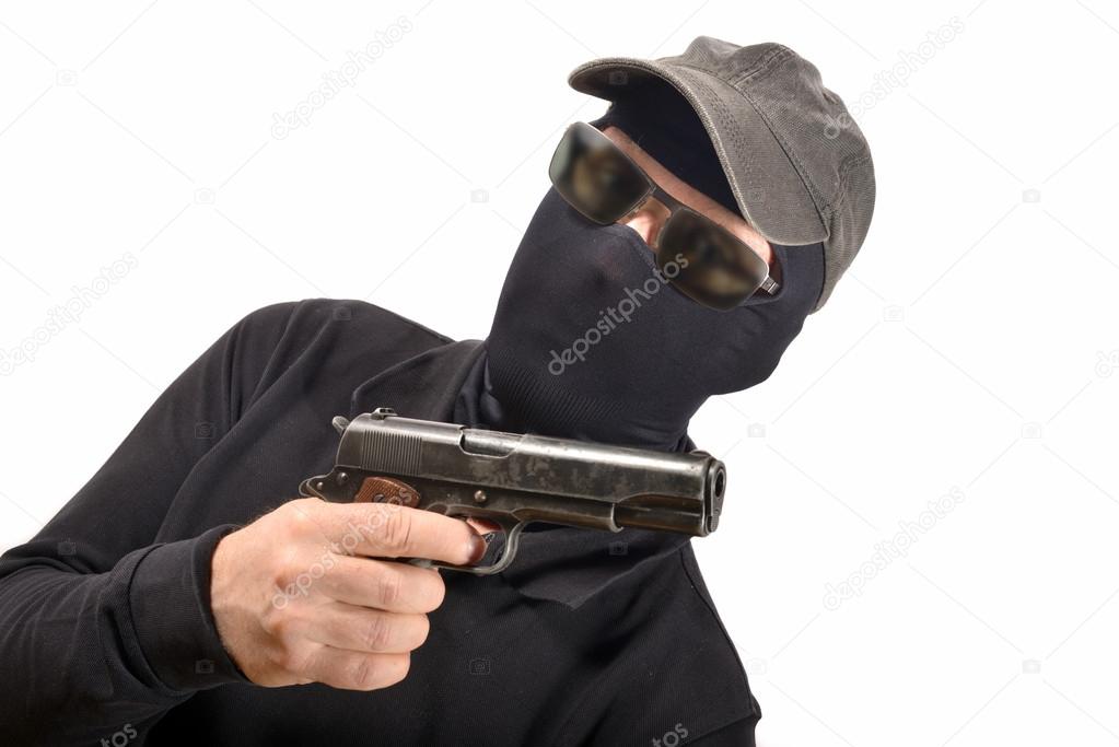 Hooded man with a gun — Stock Photo © philipimage #49327755