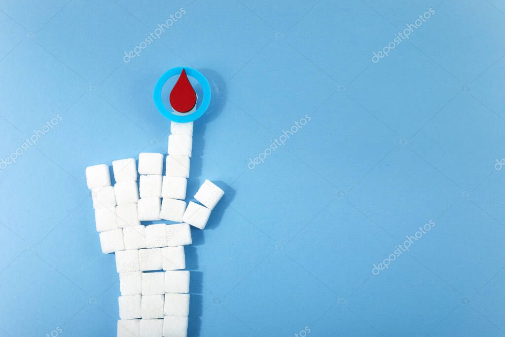 Día Mundial de la Diabetes. Círculo azul con gota de sangre y cubos de ...