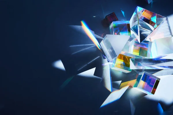 Geometric figures prisms with light diffraction of spectrum colors and ...