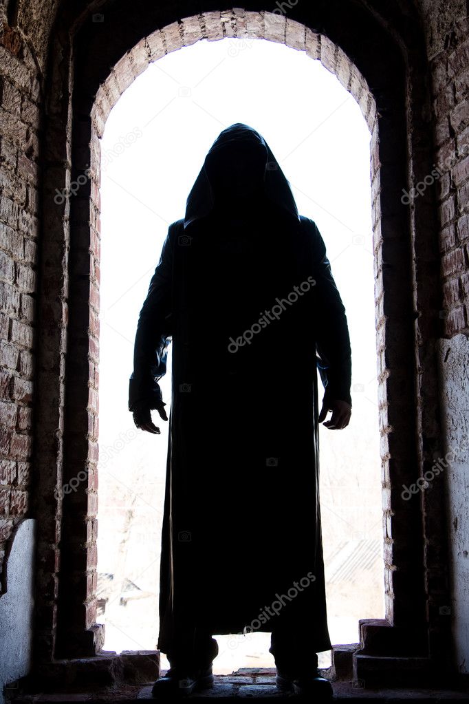 Silhouette of a man in arch — Stock Photo © ChrisTefme #44716493