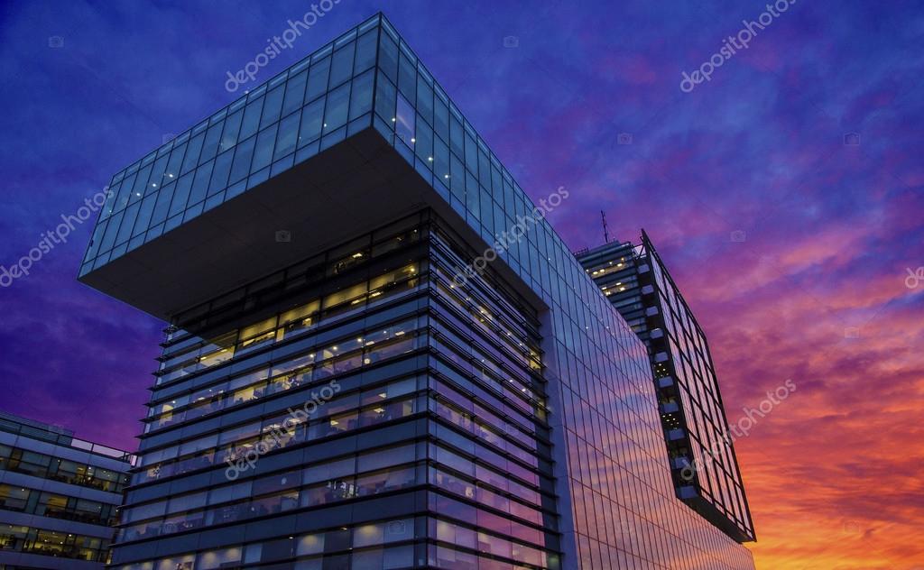Modern office building at sunset Stock Photo by ©varsescu 43545211
