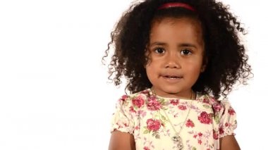 Funny mixed race black and latino brazilian little girl isolated ...