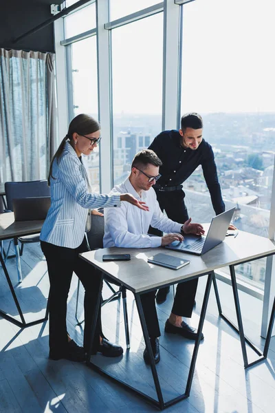 Side view of business people, male and female colleagues in casual ...