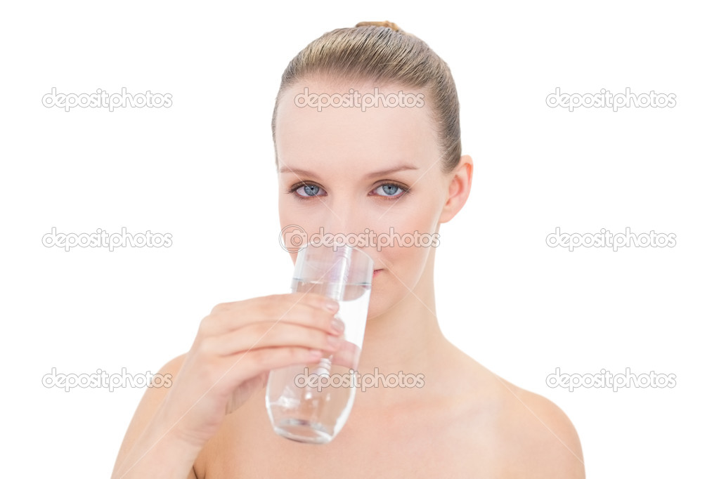 Calm pretty blonde model drinking water — Stock Photo © lightwavemedia ...