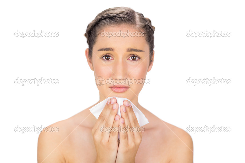 Sick young model holding tissue Stock Photo by ©lightwavemedia 31568723